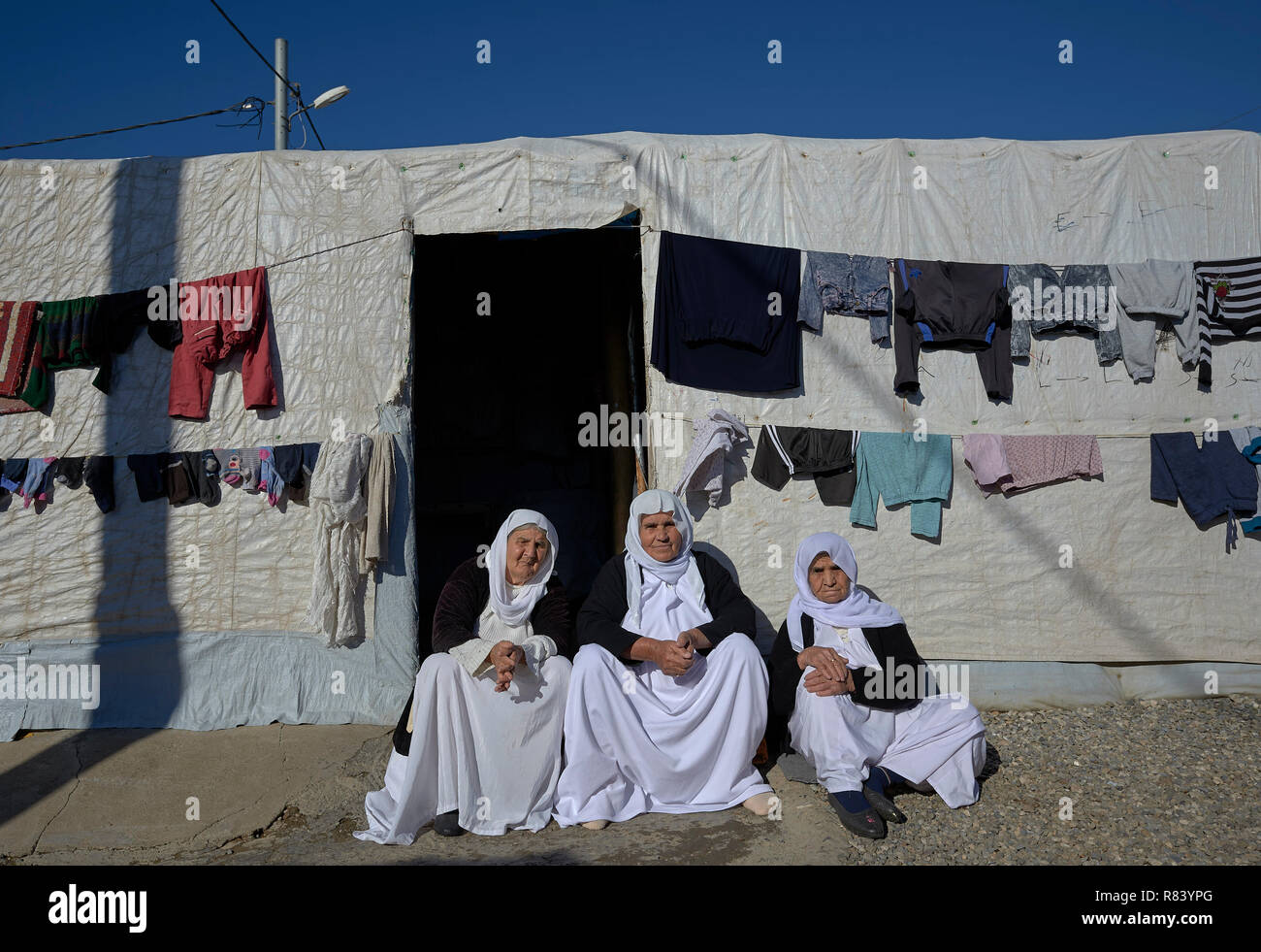 Yazidi women in a camp for internally displaced persons at Dawodiya in ...