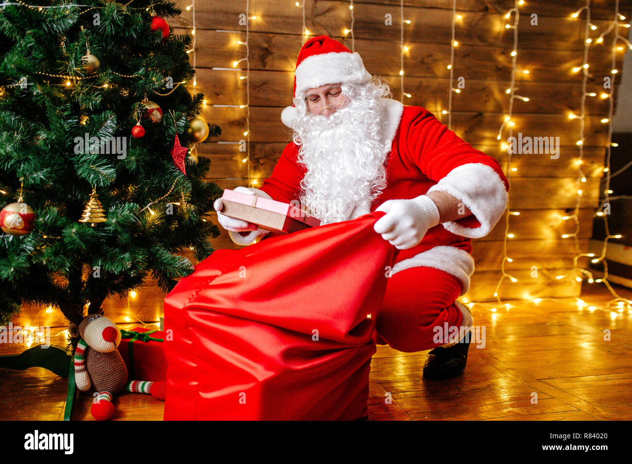 Traditional santa with gifts hi-res stock photography and images - Alamy
