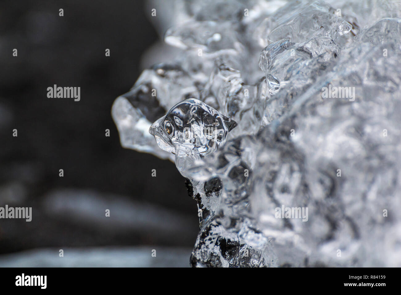 Crystal clear ice on black lava at diamond beach in iceland Stock Photo ...