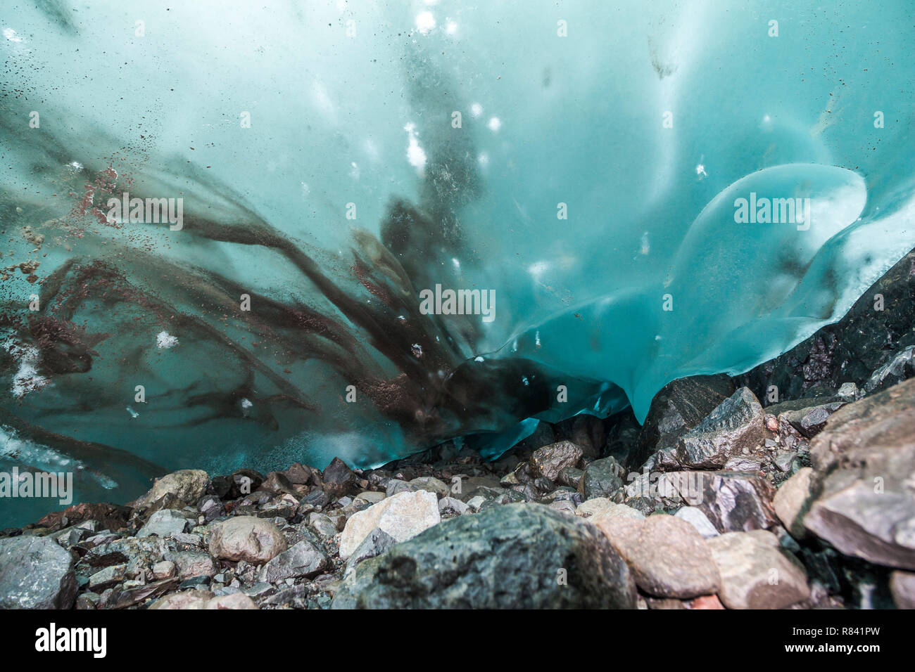 Inside small glacier cave in Iceland Stock Photo - Alamy