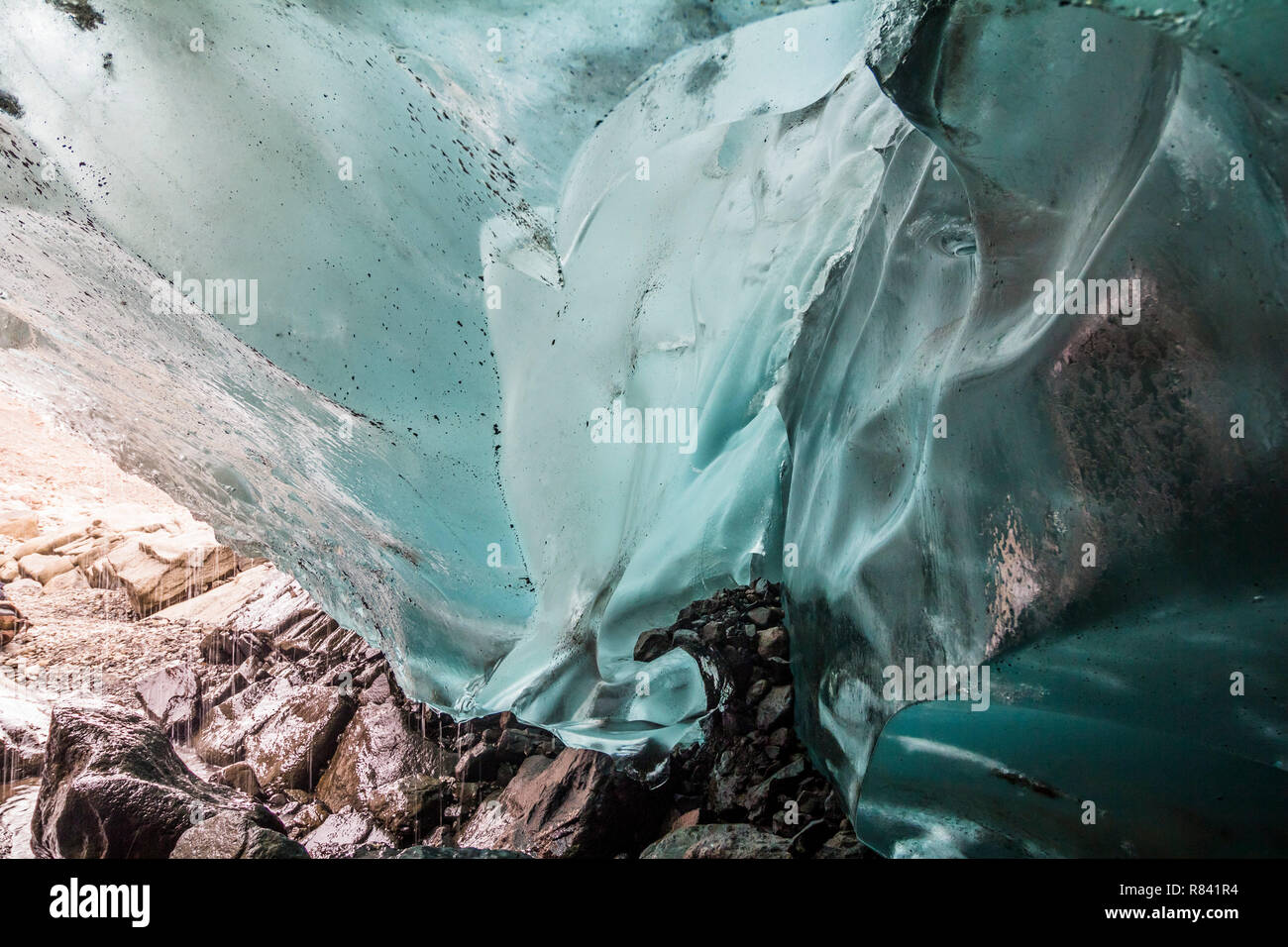 Inside small glacier cave in Iceland Stock Photo - Alamy