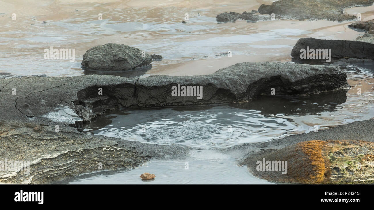 Geothermic activity in mud pools of Hverir in Iceland Stock Photo - Alamy