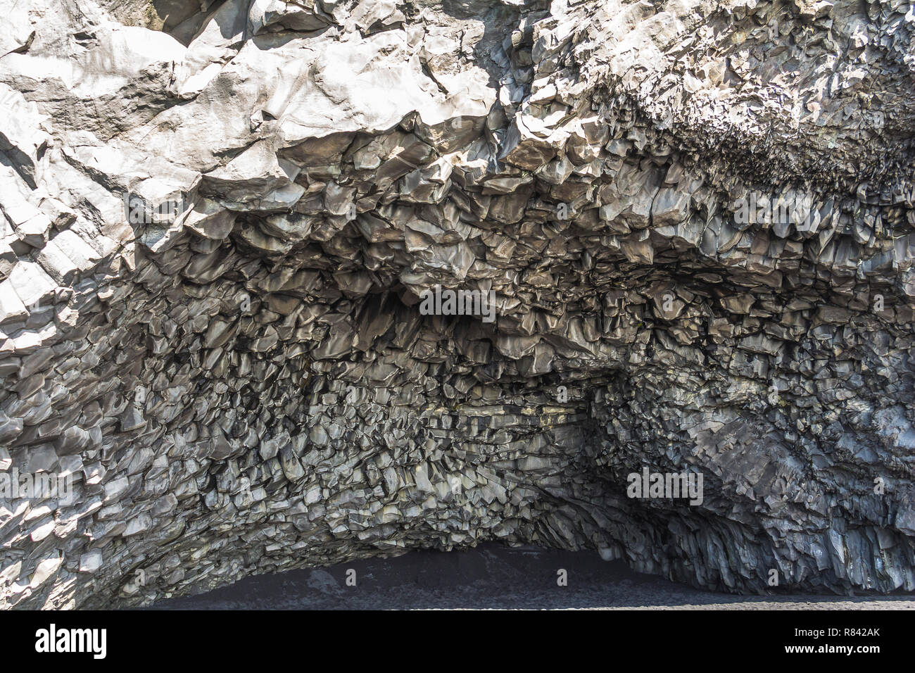 Reynisfjara Beach - small cave with stone formations Stock Photo - Alamy