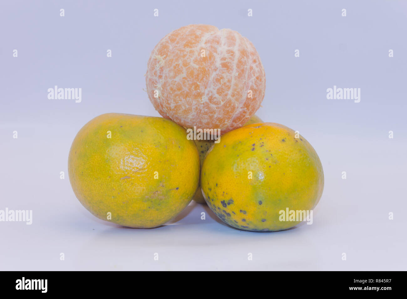 fresh yellow orange fruit orange group and peel on top of range group ...