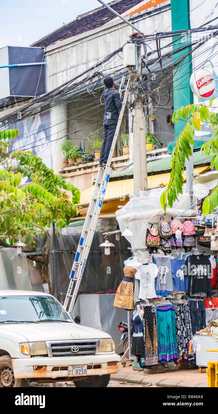 Electrician standing on ladder hi-res stock photography and images - Alamy