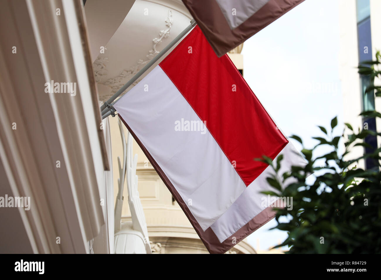 Flag Of Monaco On A Wall In Monte-Carlo, Monaco, Close Up View Stock ...