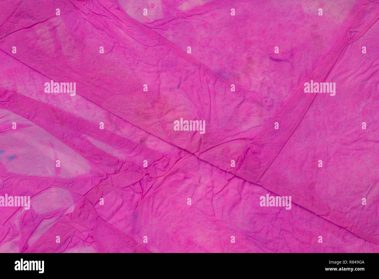 pink color creased paper tissue texture background Stock Photo - Alamy
