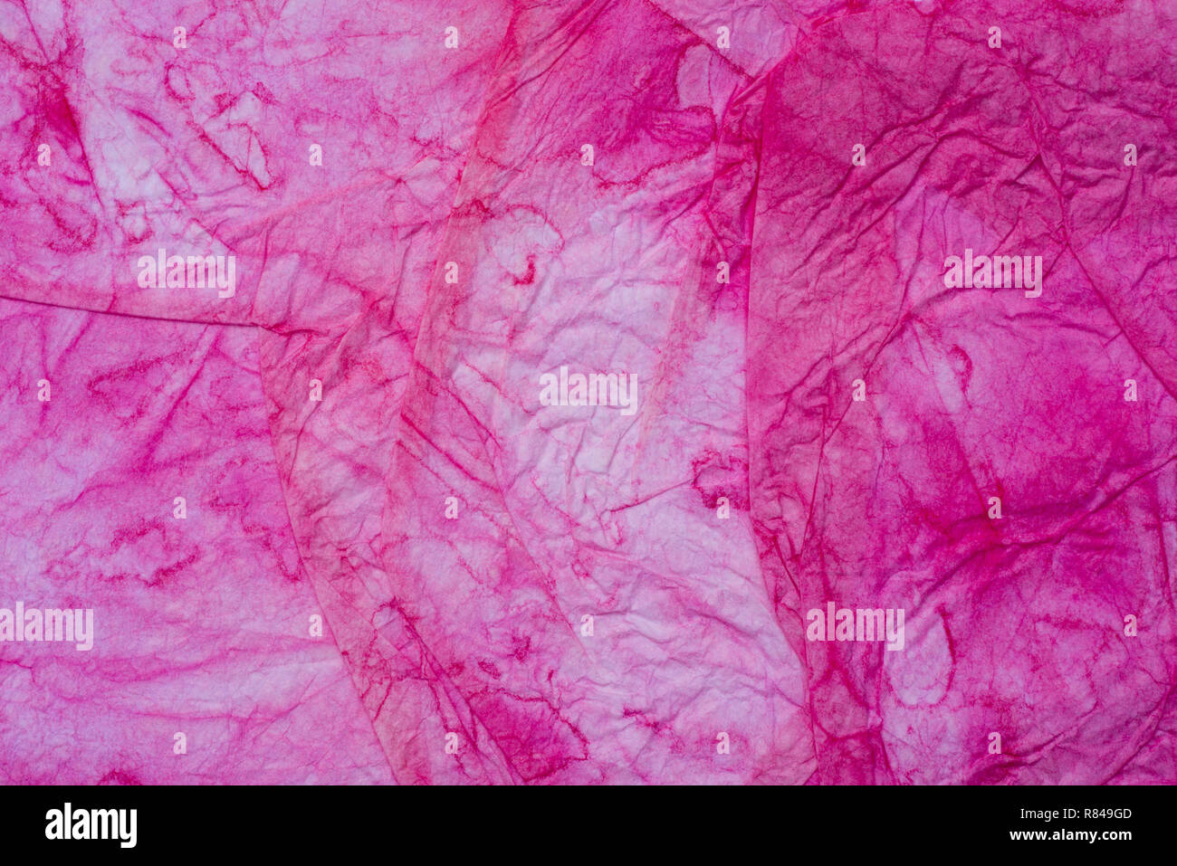 pink color creased paper tissue texture background Stock Photo - Alamy