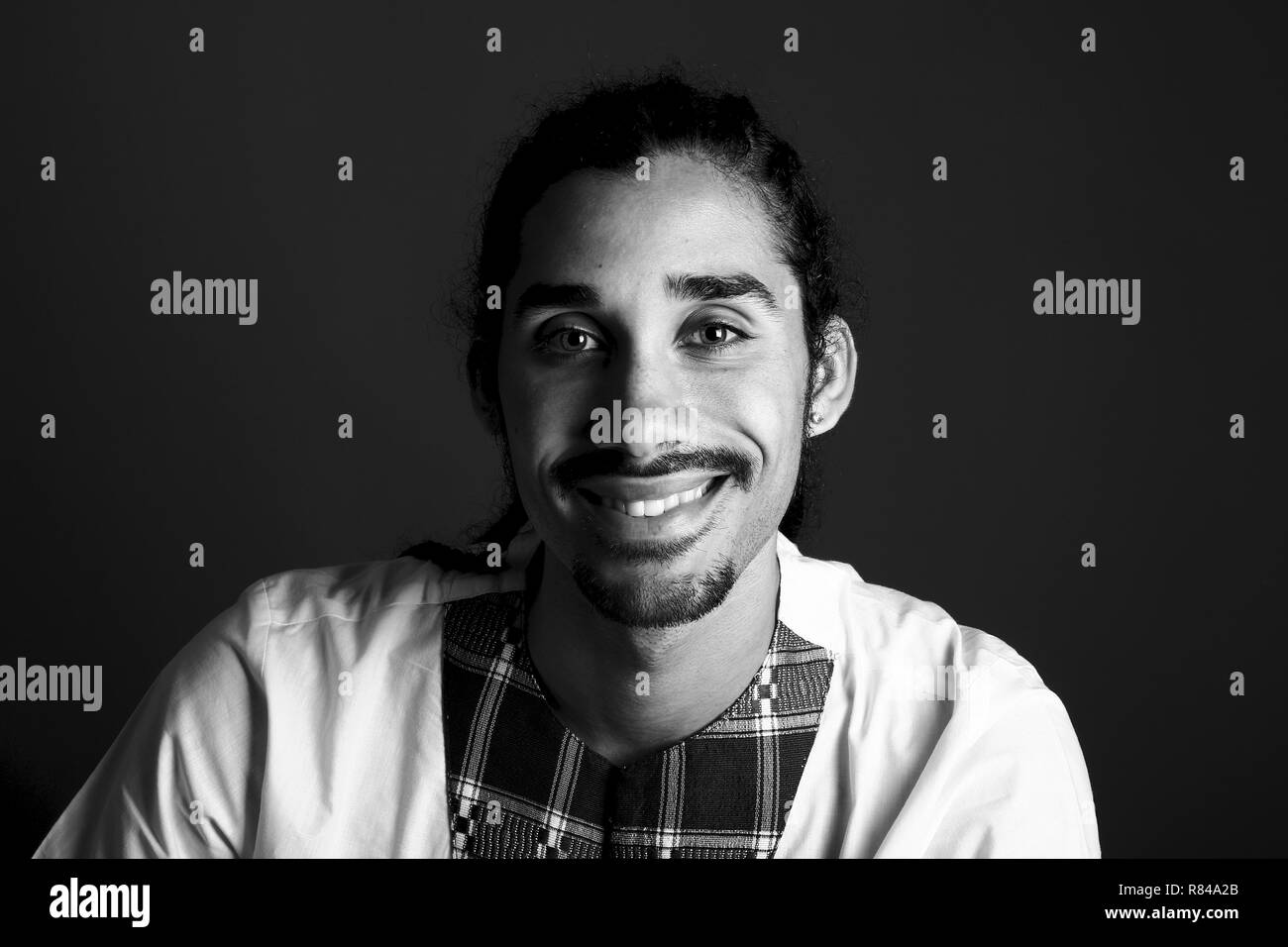 Beautiful man in front of a background Stock Photo - Alamy