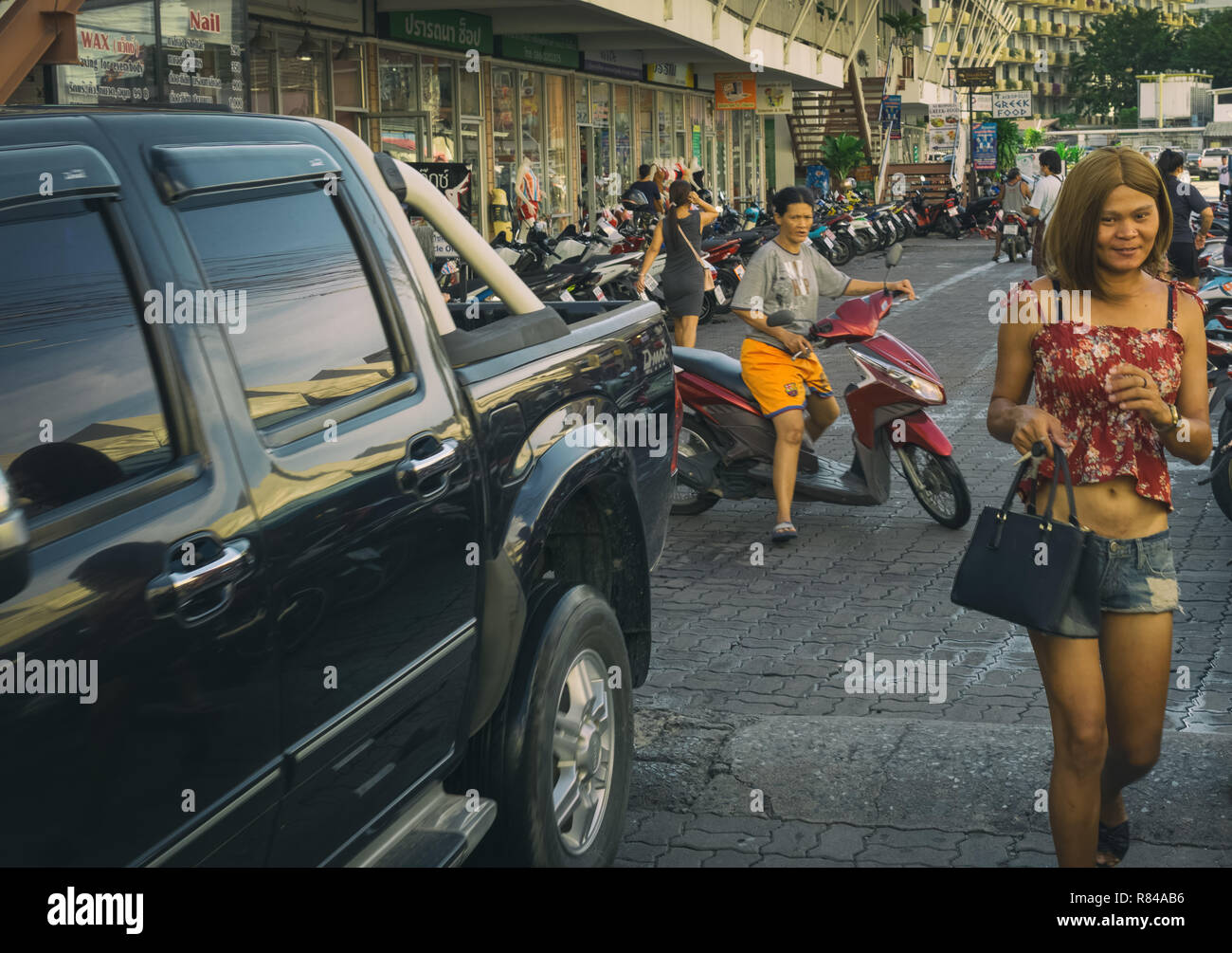 PATTAYA,THAILAND - OCTOBER 22,2018: Soi Buakhaow A young Thai woman was ...