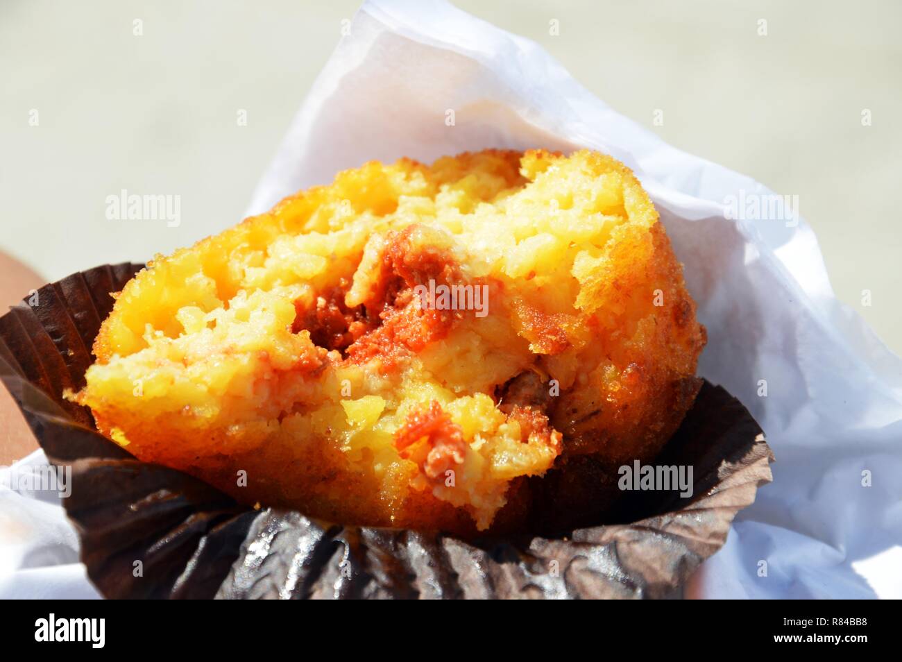 Arancino, typical sicilian street food made with rice Stock Photo - Alamy