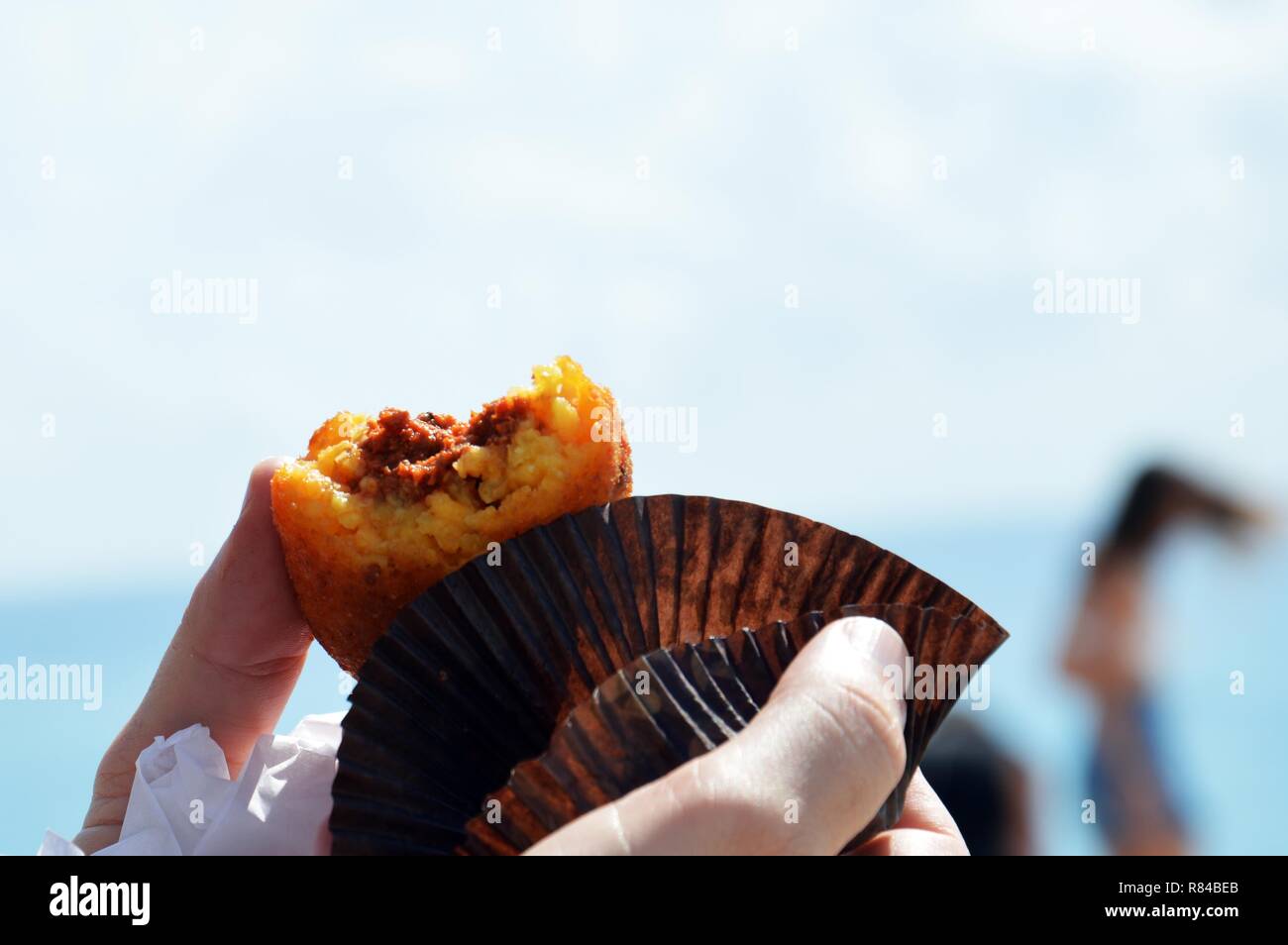 Arancino, typical sicilian street food made with rice Stock Photo - Alamy
