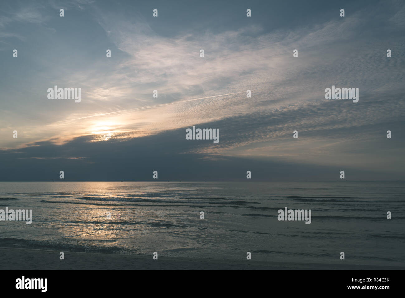 calm blue sunset over clear water in baltic sea. minimalistic image ...