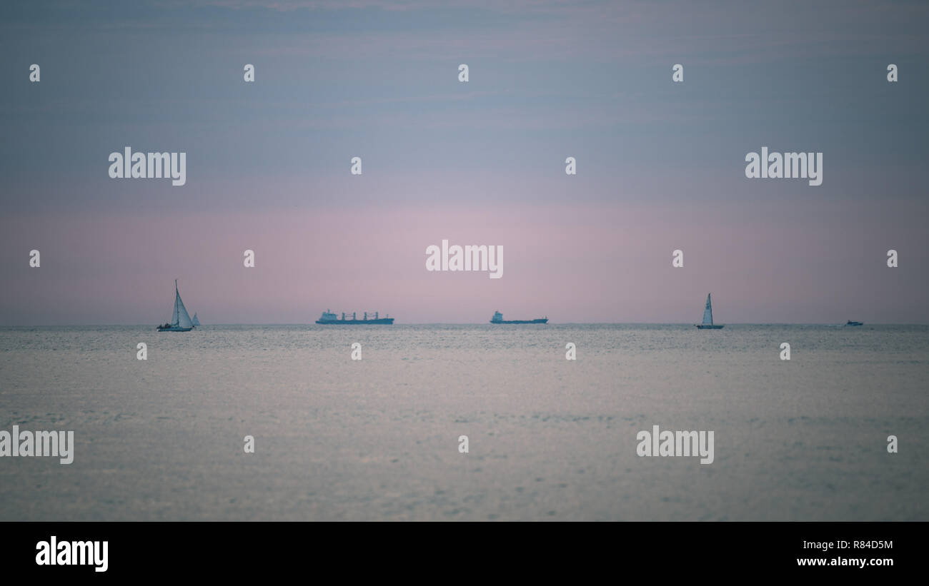 calm blue sunset over clear water in baltic sea. minimalistic image ...