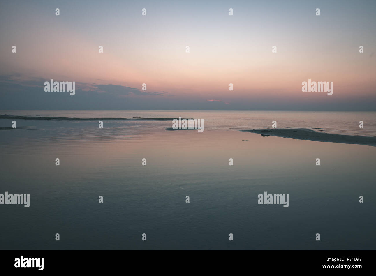 calm blue sunset over clear water in baltic sea. minimalistic image ...