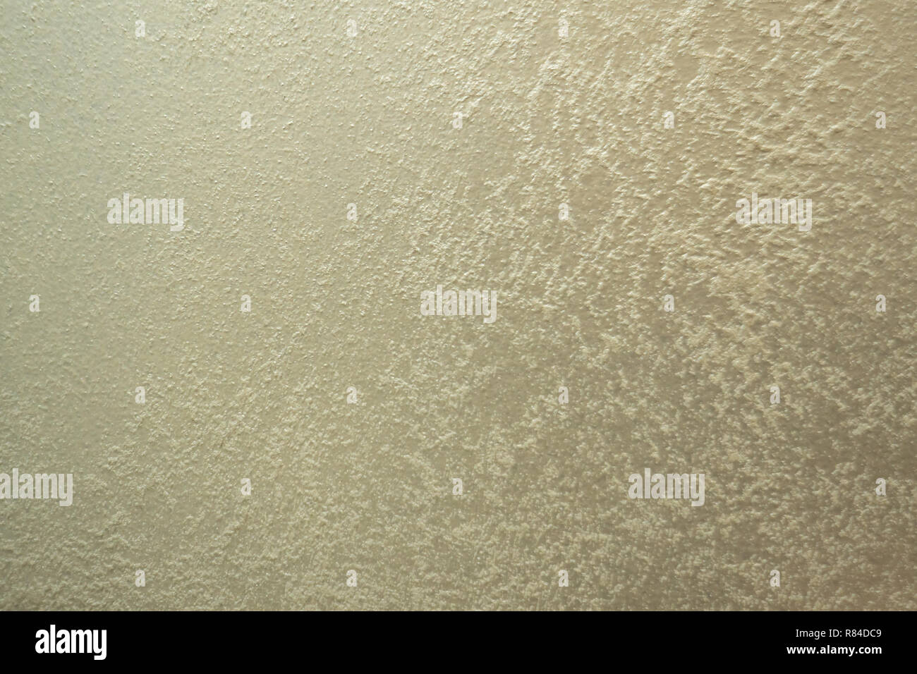 white Structural plaster on black wall Stock Photo - Alamy