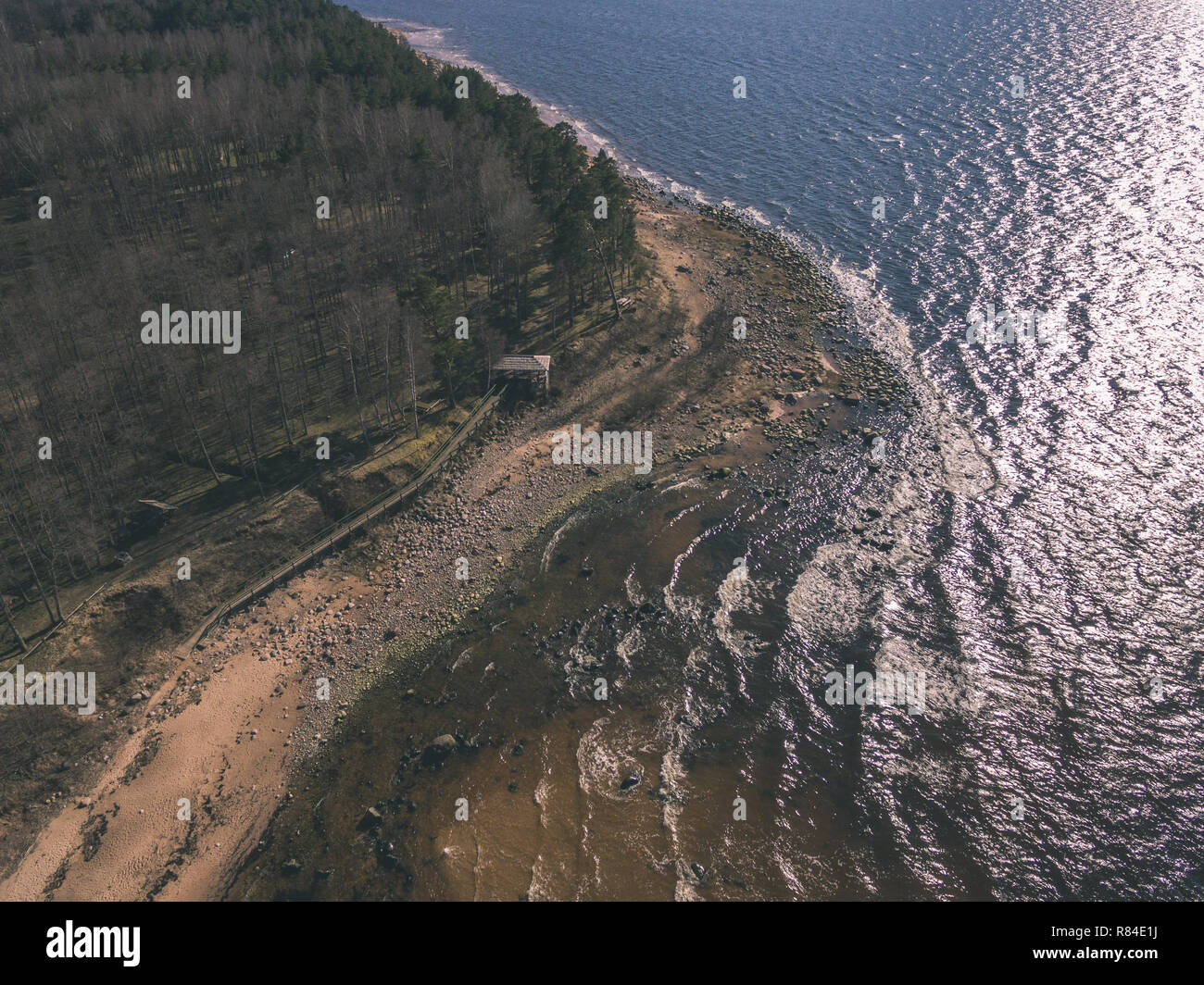 drone image. aerial view of rural area with rocky beach of Baltic sea ...