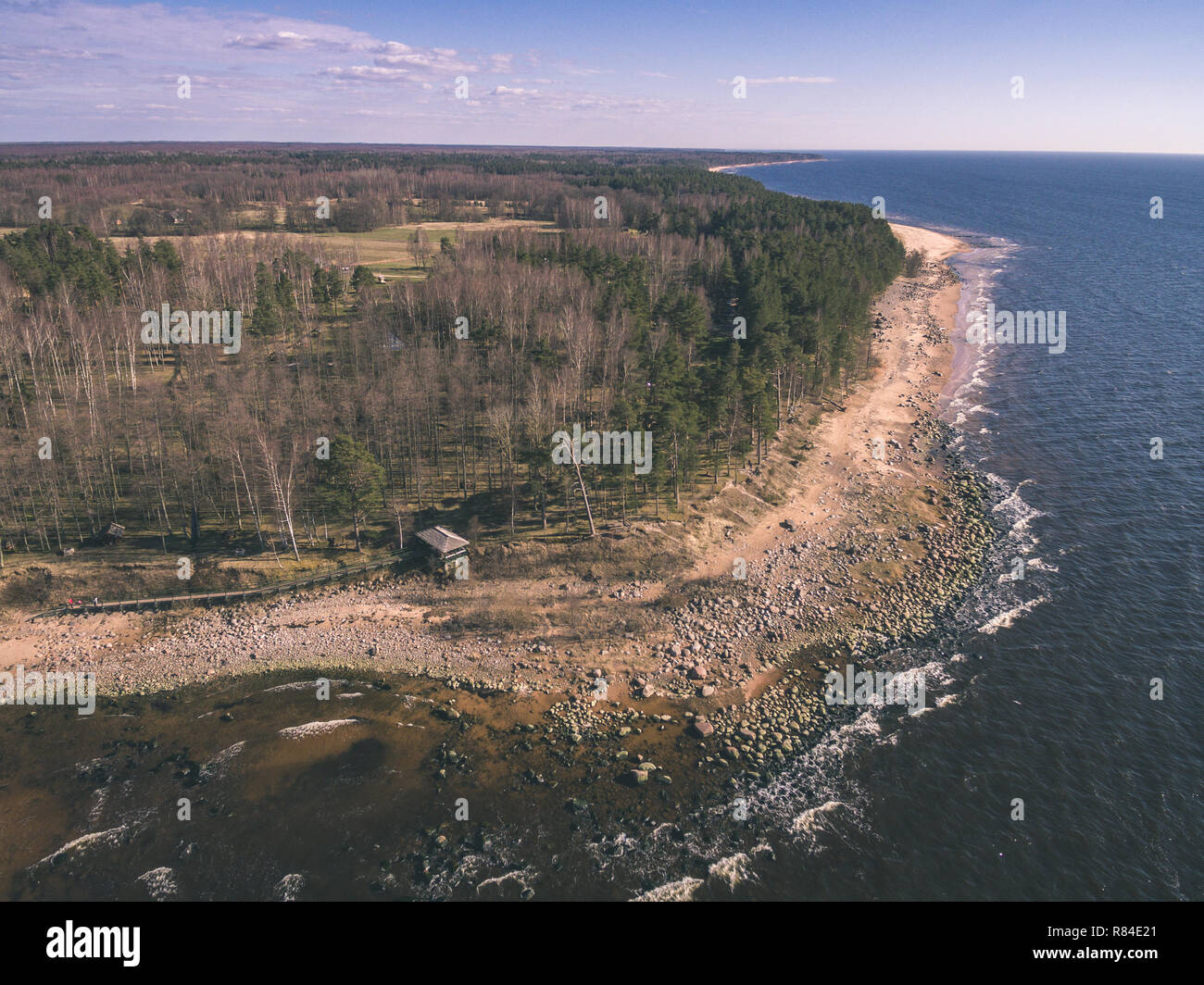 drone image. aerial view of rural area with rocky beach of Baltic sea ...