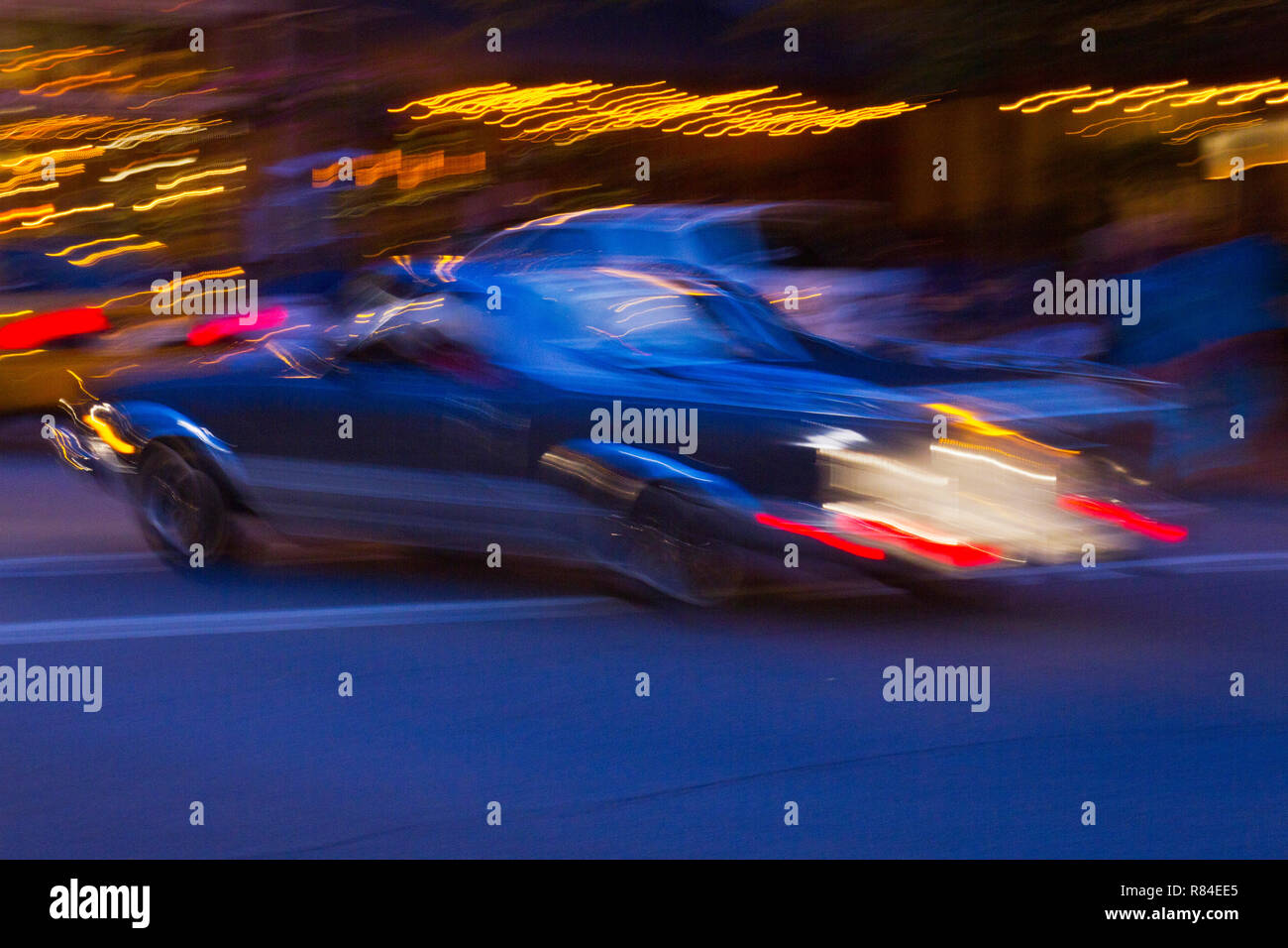 Car speeding town hi-res stock photography and images - Alamy