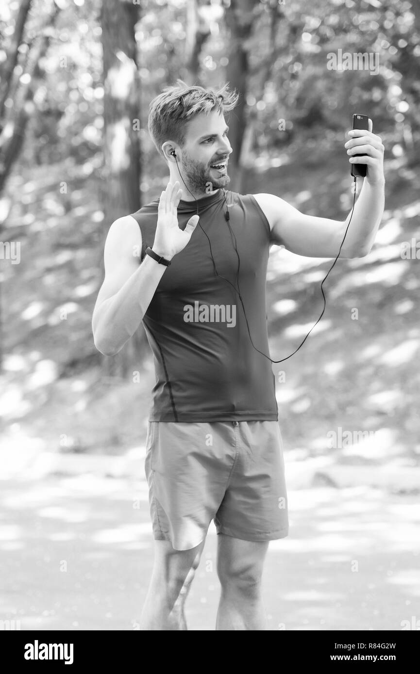 Smiling guy online video Black and White Stock Photos & Images - Alamy