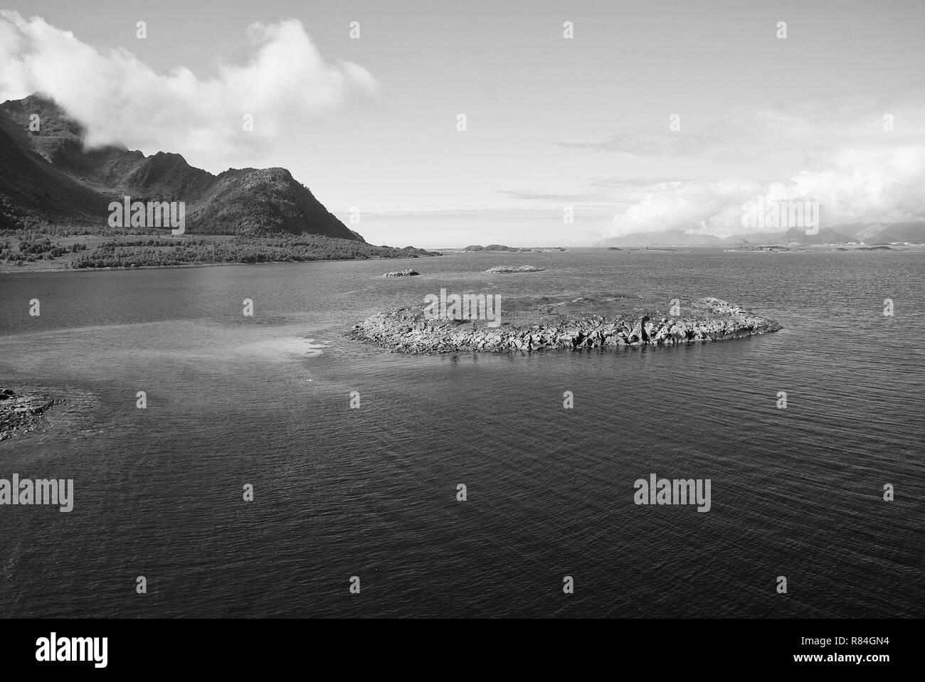 Discover world. Round world cruise. Island stony surrounded idyllic sea ...