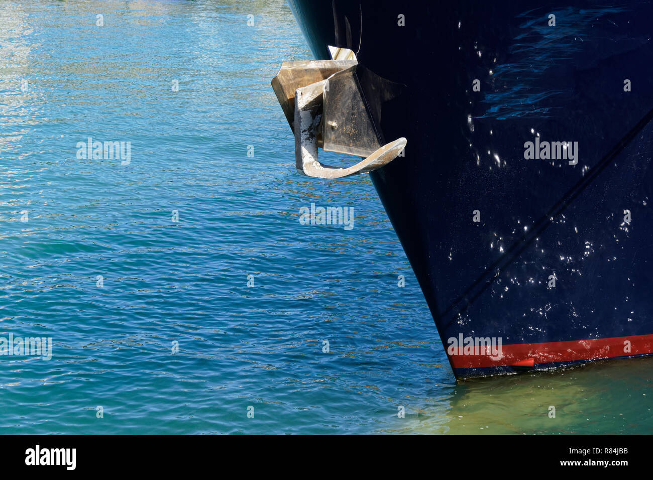 Anchor on a ship's bow in harbour Stock Photo - Alamy
