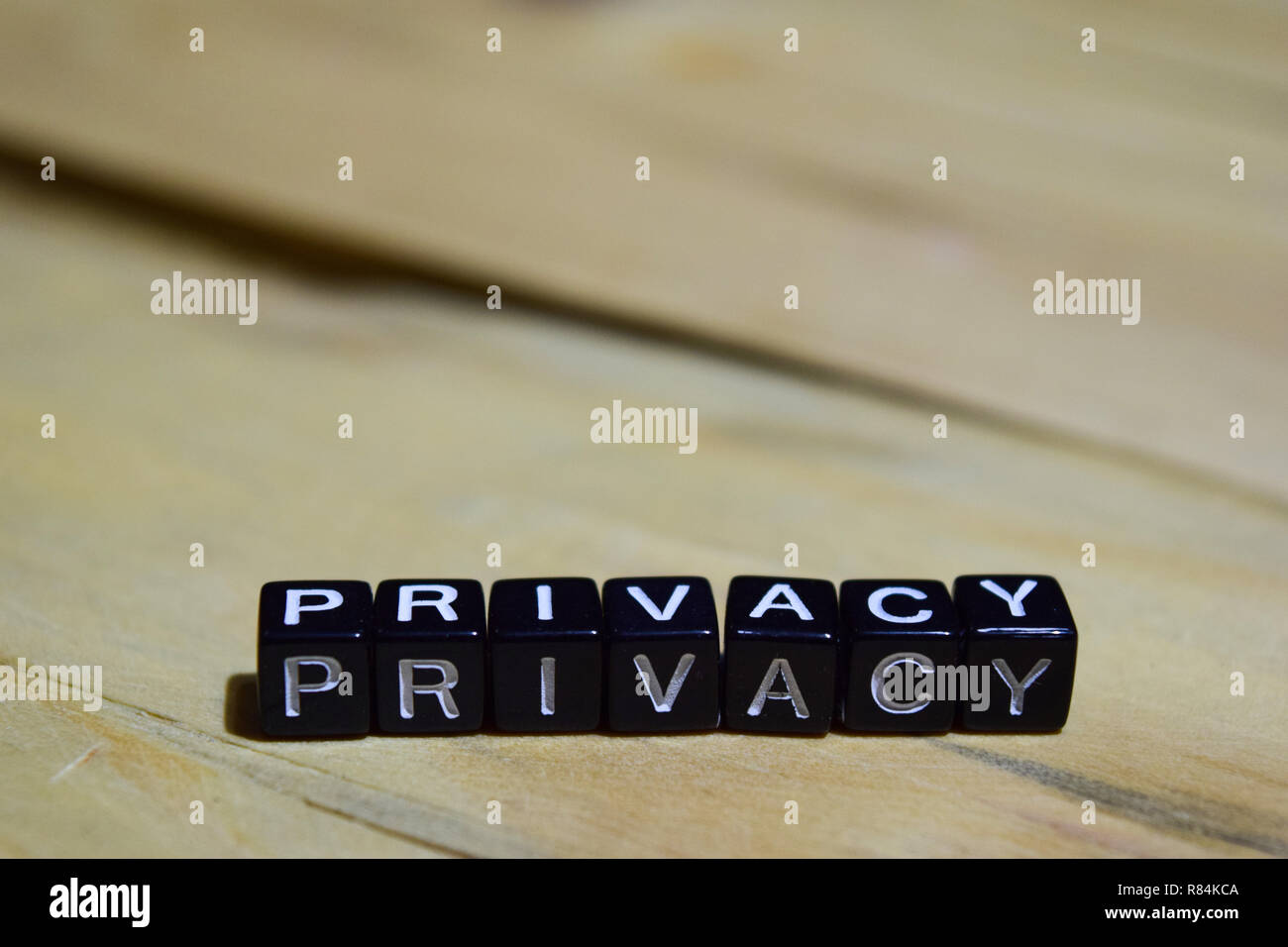 Privacy message written on wooden blocks. education and motivation ...