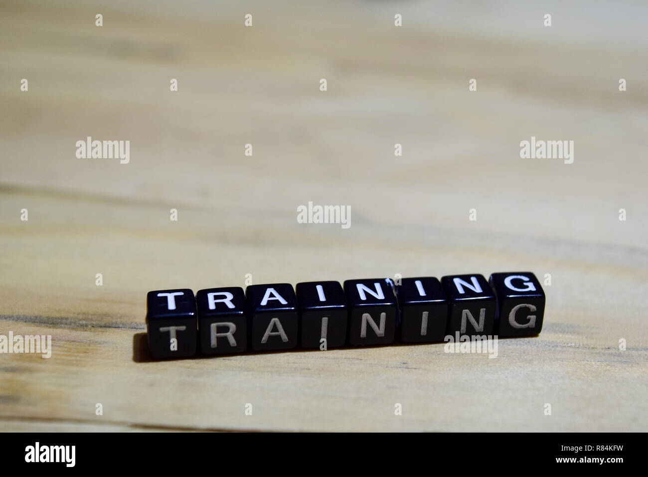 Training message written on wooden blocks. education and motivation ...