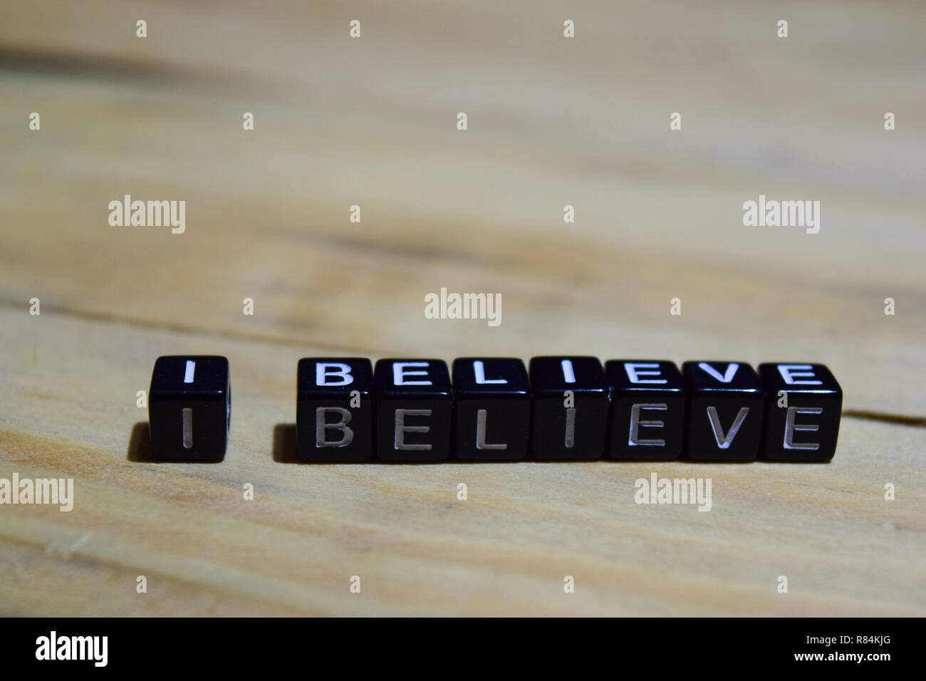 I believe message written on wooden blocks. education and motivation ...