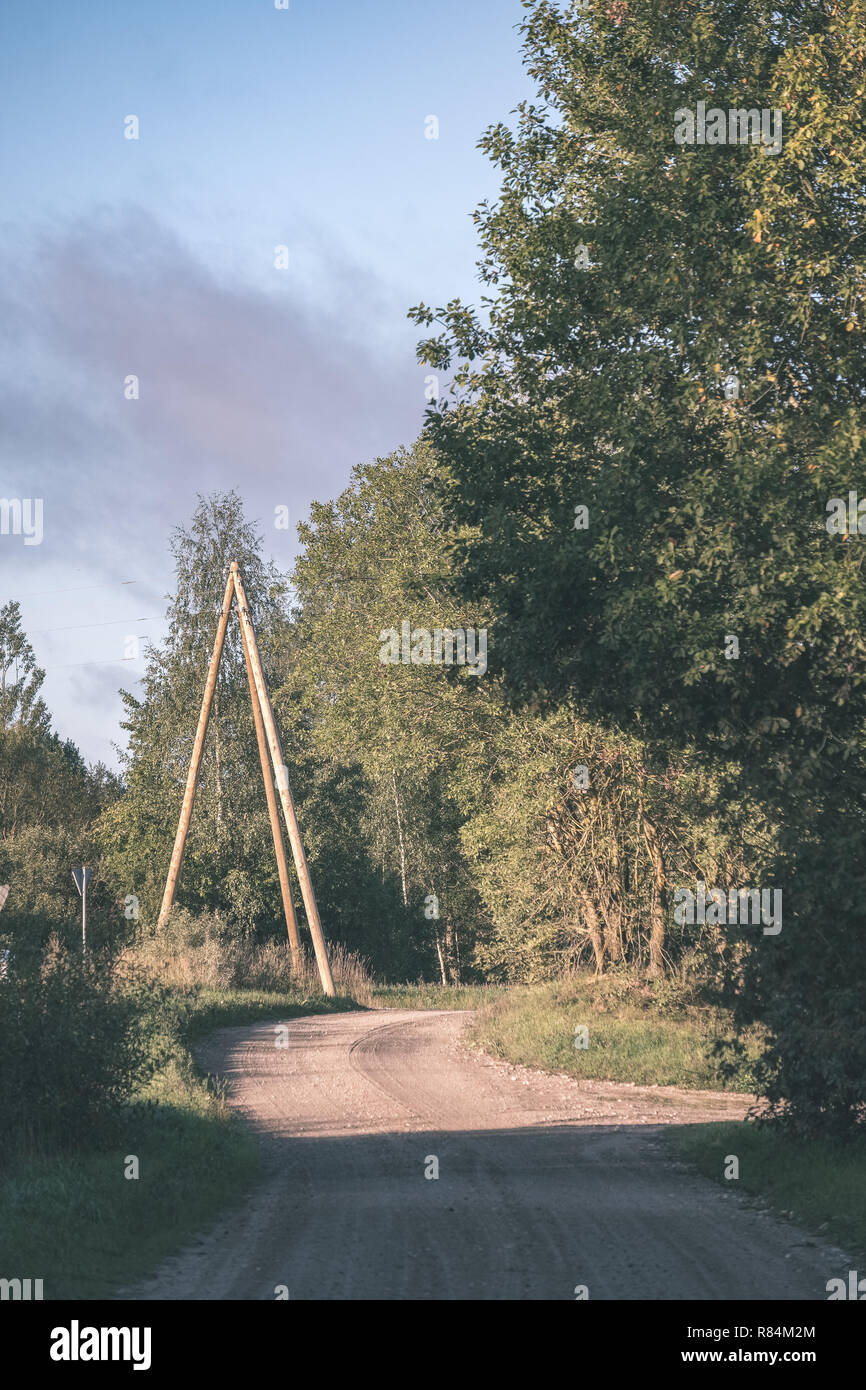 power line electricity poles in country with wires - vintage old film ...