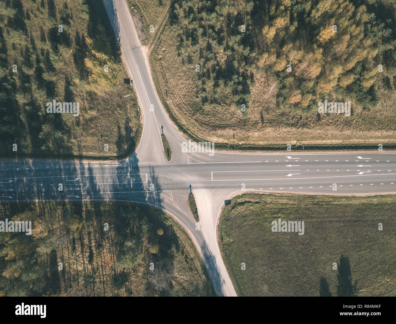 drone image. aerial view of traffic junction in autumn countryside with ...