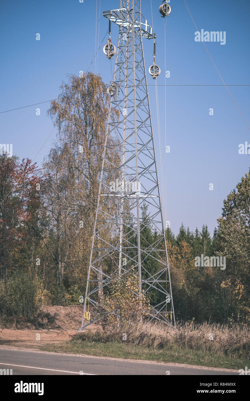 power line electricity poles in country with wires - vintage old film ...