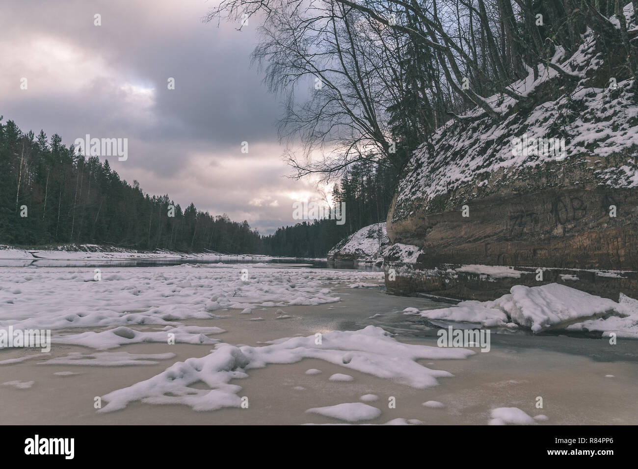 frozen sea side beach panorama in winter with lots of ice and snow in ...