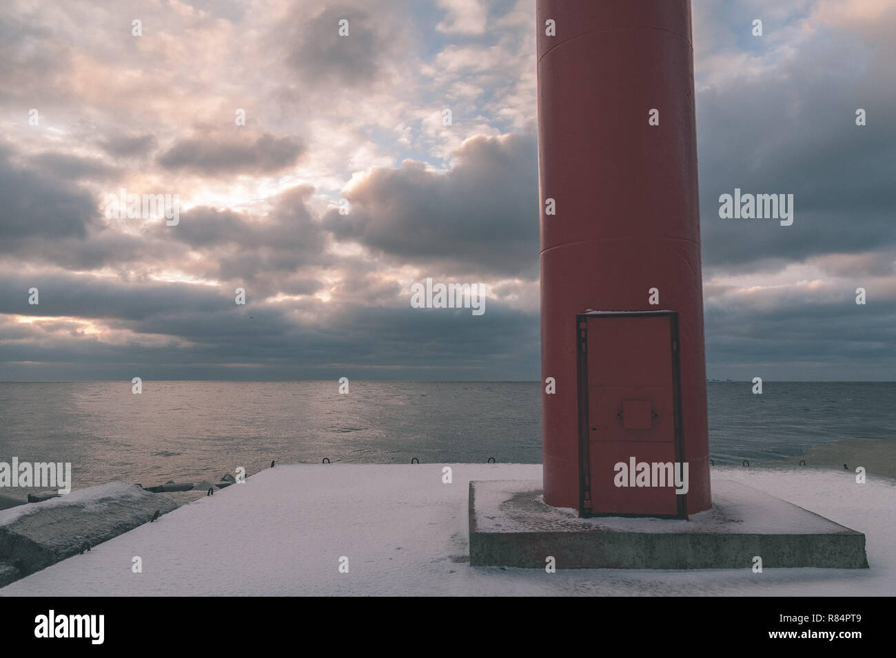 frozen sea side beach panorama in winter with lots of ice and snow in ...