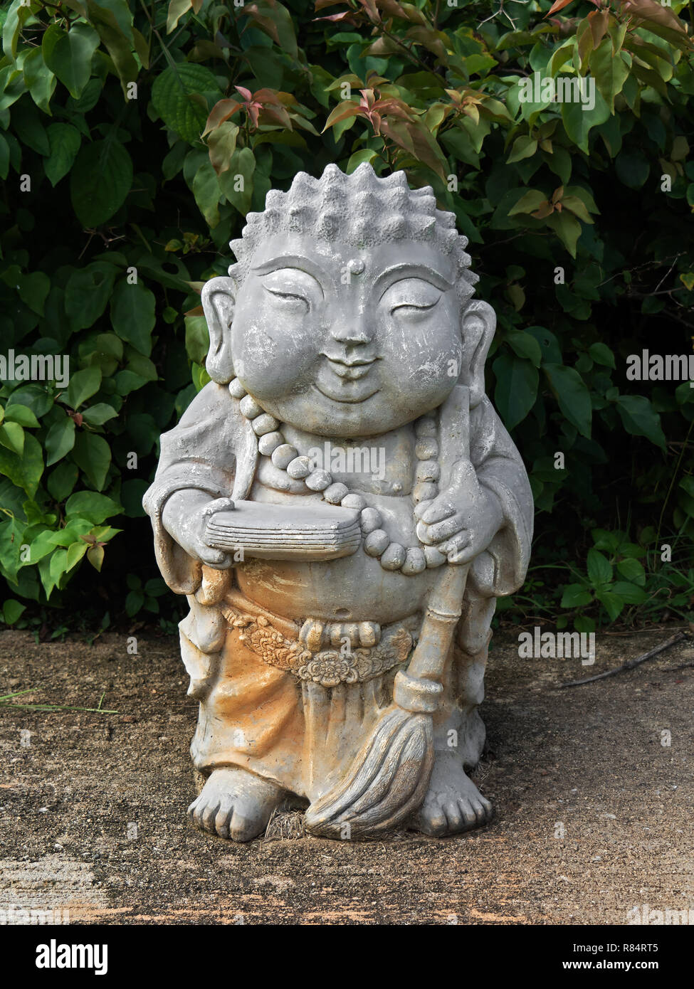 Cute Smile Japanese Buddha Statue with Large Bead Necklace and Broom on ...