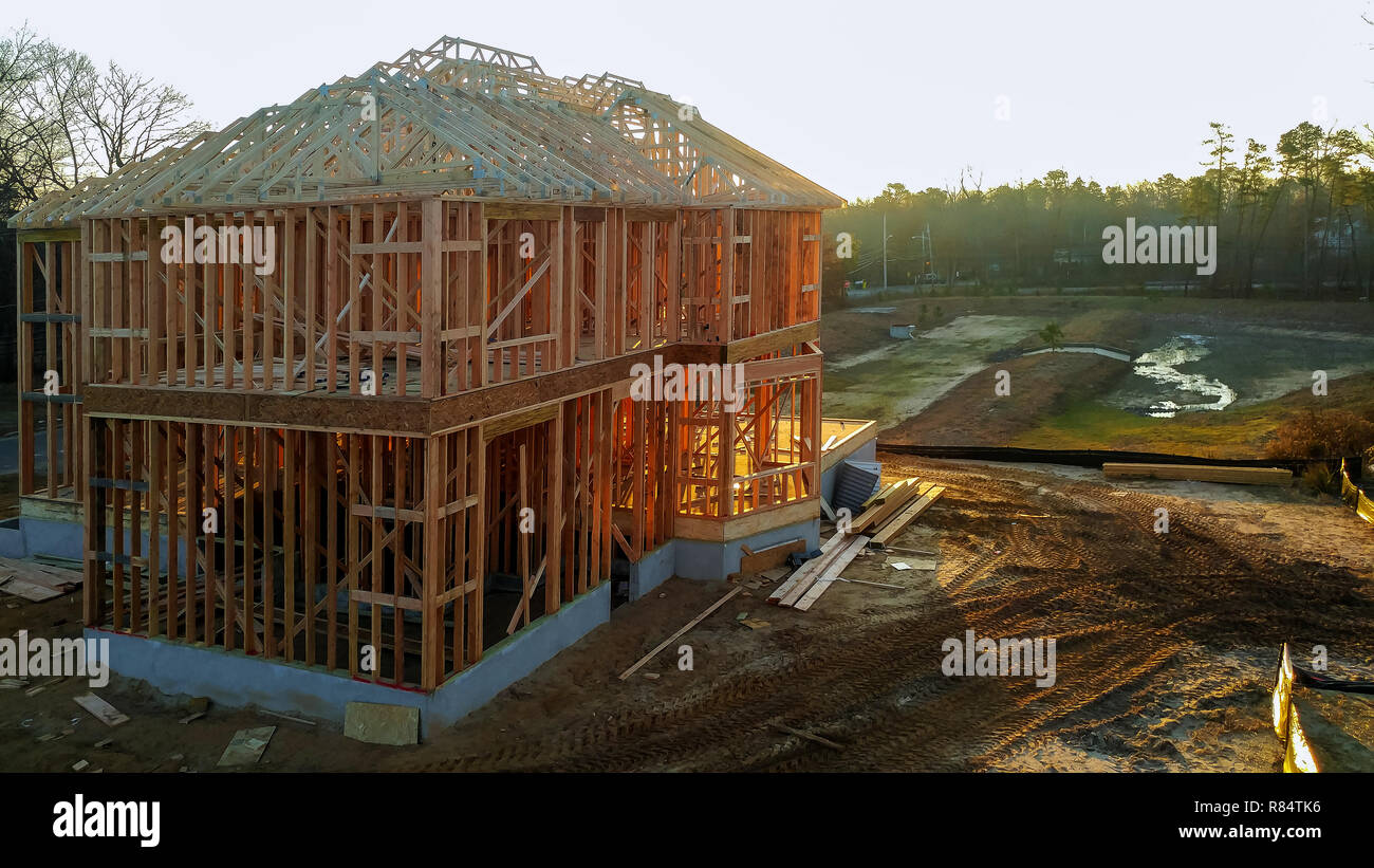 A stick built house under construction New build with wooden truss ...