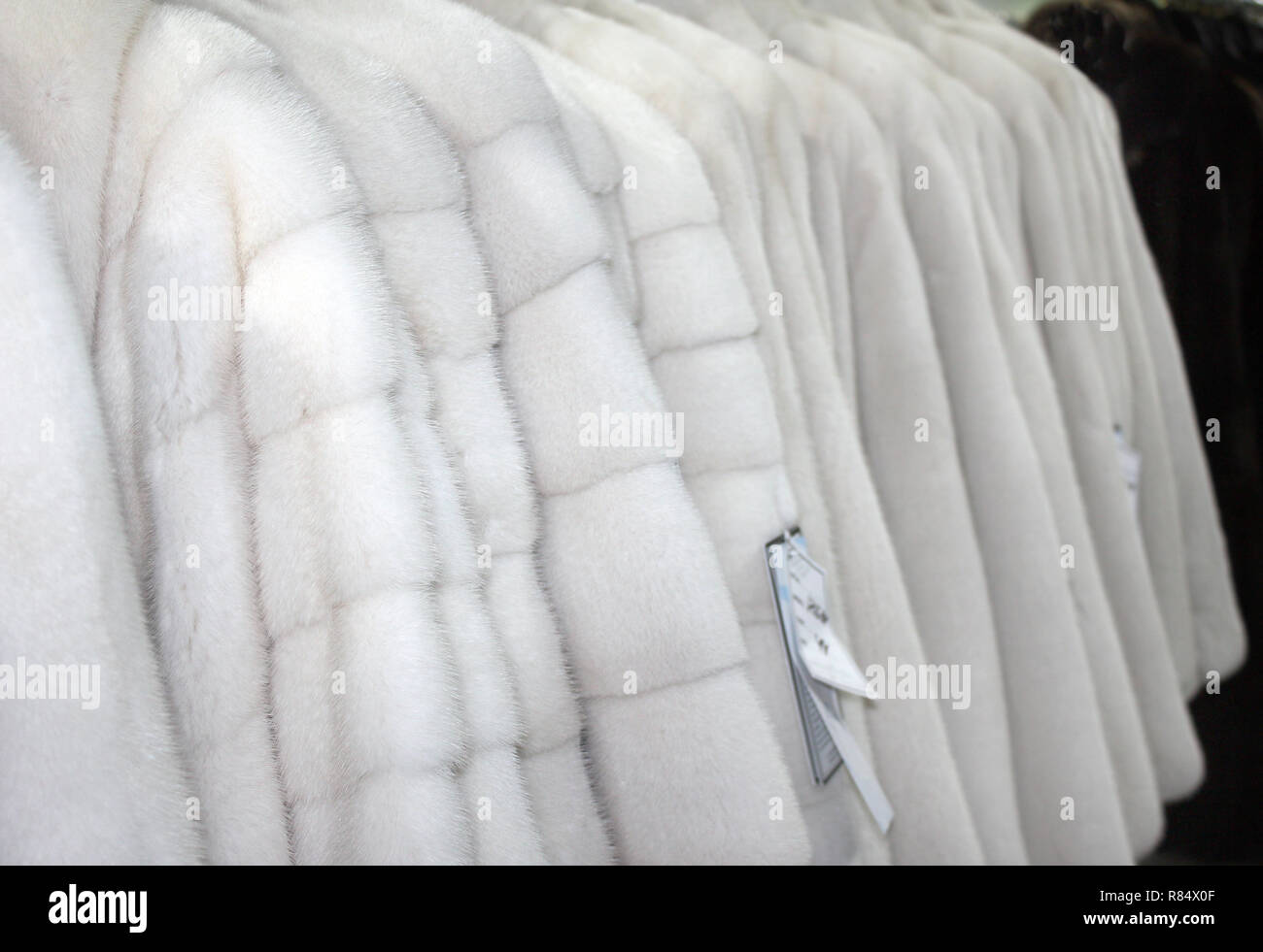 Row of many fur coats Stock Photo - Alamy