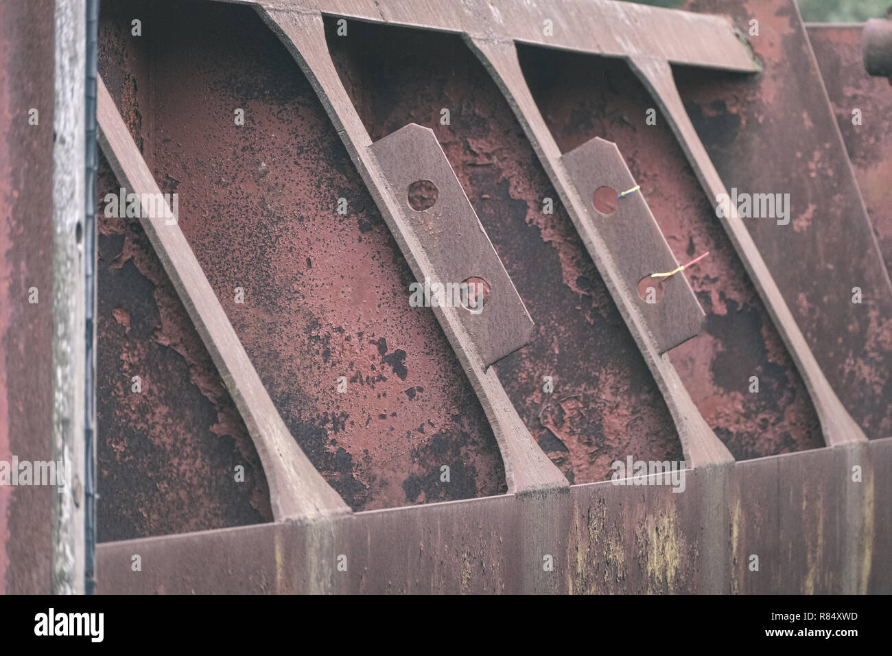 old red metal bridge over water. rusty details and close ups - vintage ...