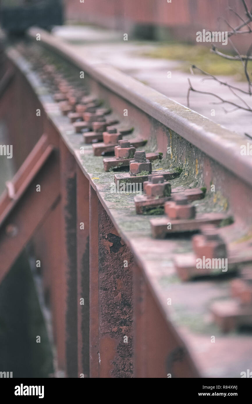 old red metal bridge over water. rusty details and close ups - vintage ...