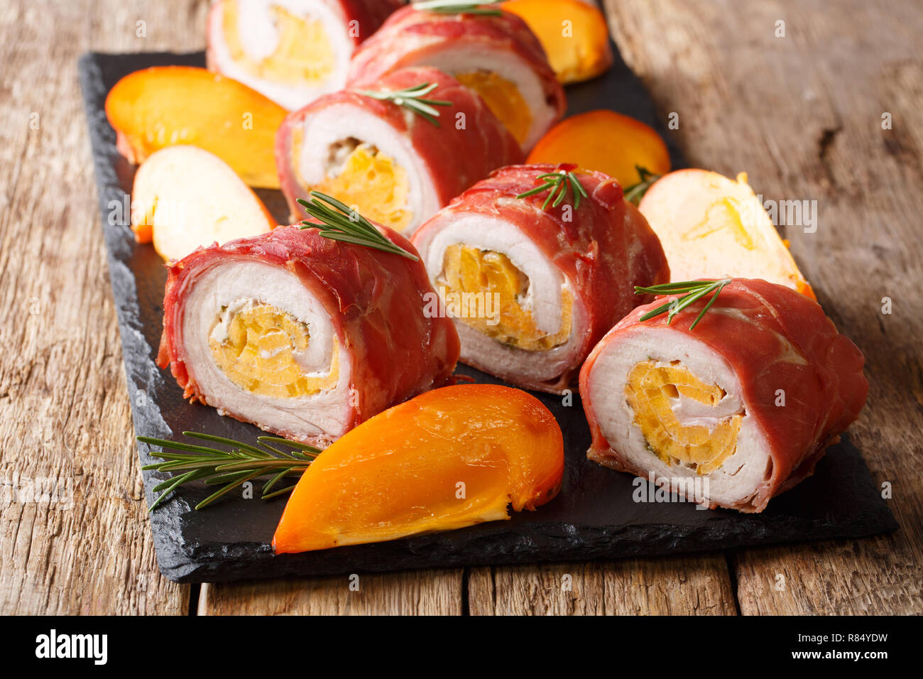 Christmas pork roll baked in prosciutto and stuffed with fresh ...