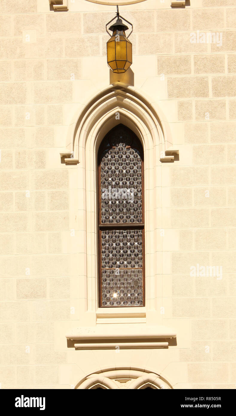 Ancient stained-glass window on stone wall Stock Photo - Alamy