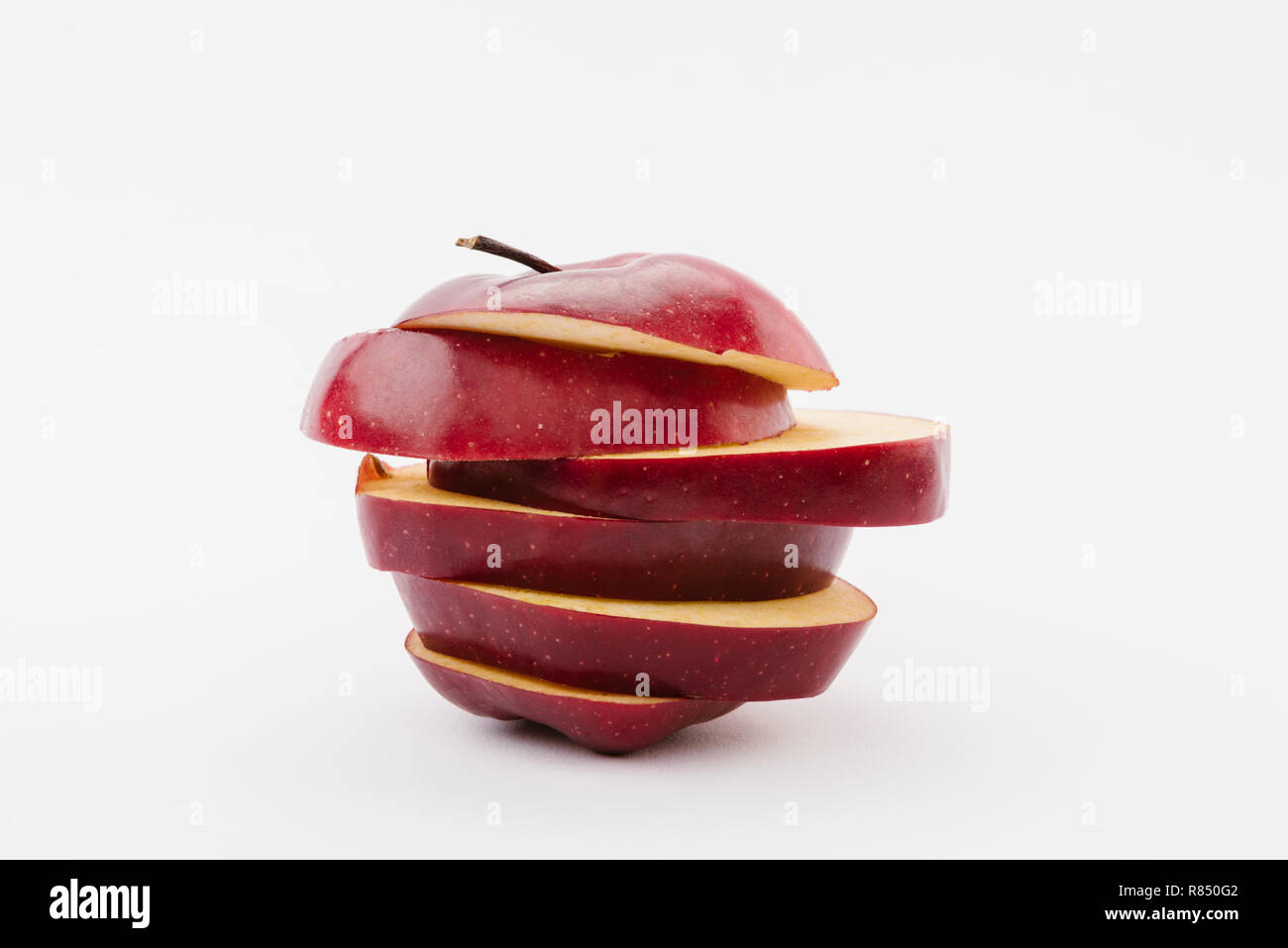 fresh sliced red delicious apple on white background Stock Photo - Alamy