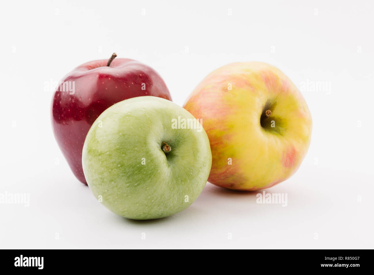 fresh red, green and yellow apples on white background Stock Photo - Alamy