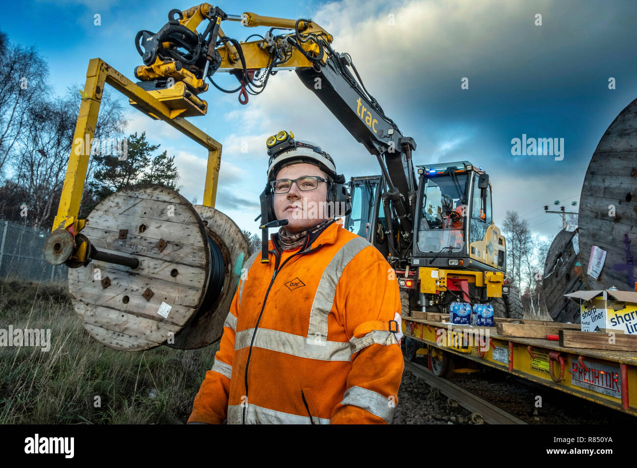Rail workers laying new track, balls, installing points and laying ...