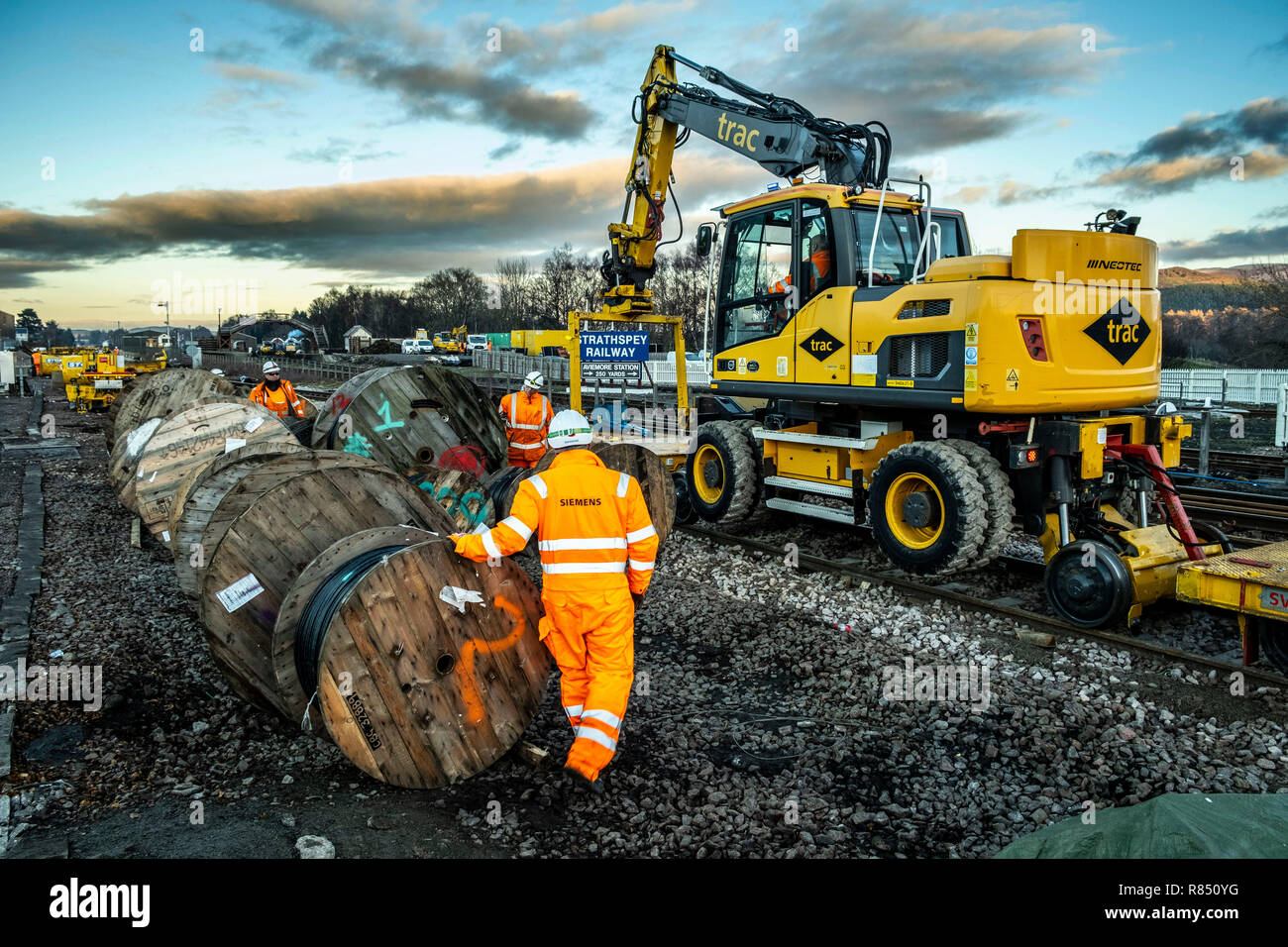 Rail workers laying new track, balls, installing points and laying ...