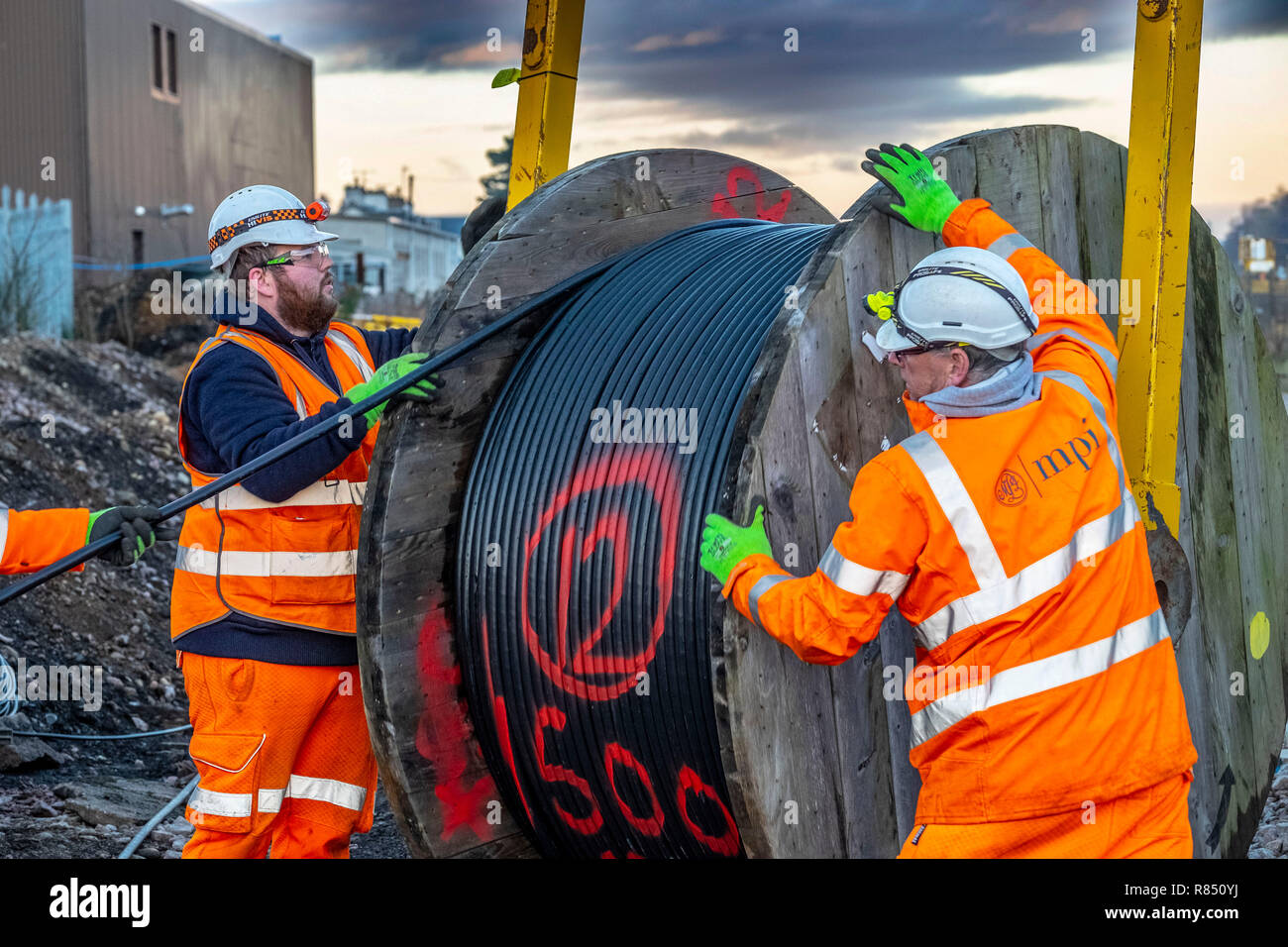 Rail workers laying new track, balls, installing points and laying ...