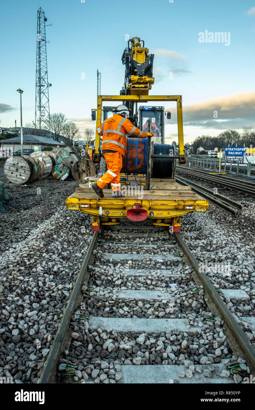 Rail workers laying new track, balls, installing points and laying ...