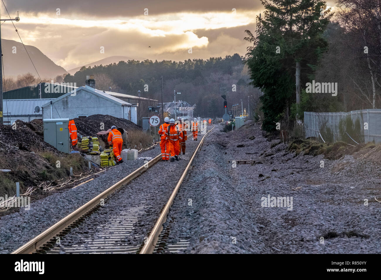 Rail workers laying new track, balls, installing points and laying ...