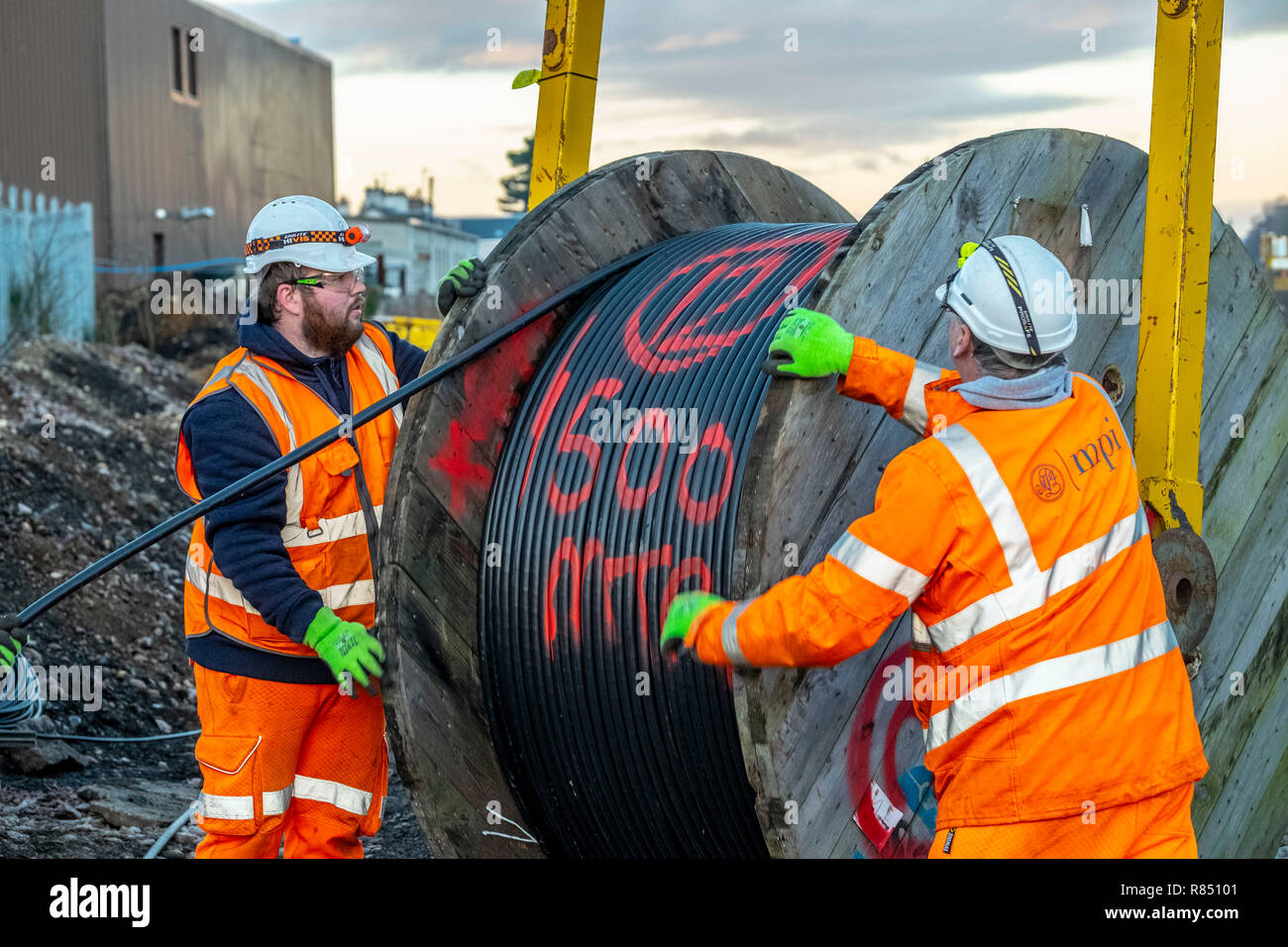 Rail workers laying new track, balls, installing points and laying ...
