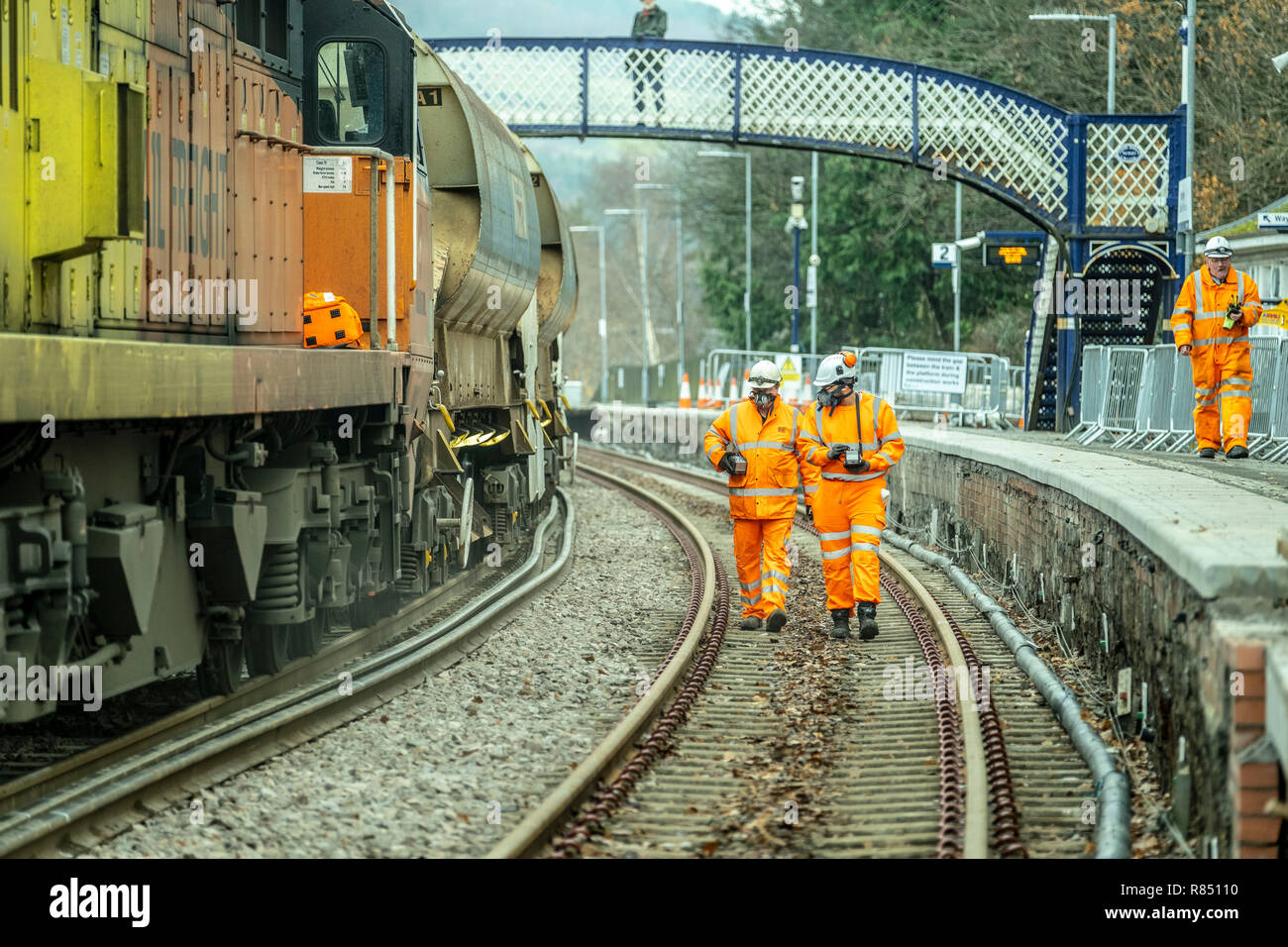 Rail workers laying new track, balls, installing points and laying ...